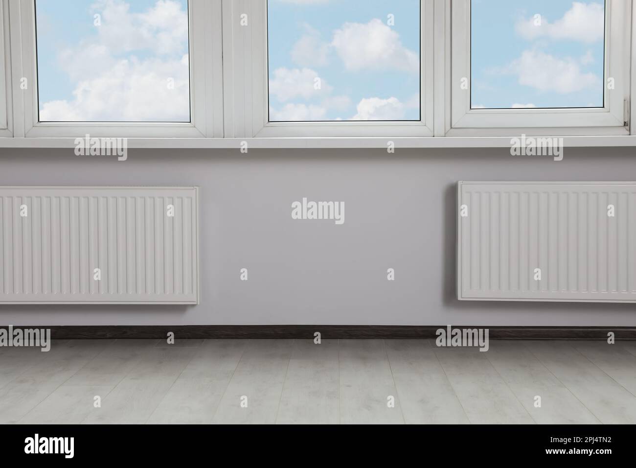 Modern office with window and radiators. Interior design Stock Photo ...