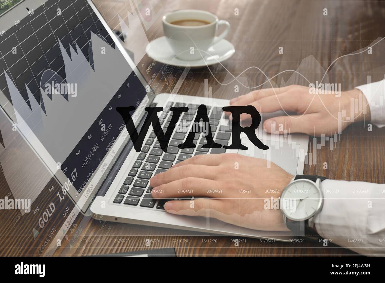 Influence of war on stock exchange. Man using laptop at table and ...