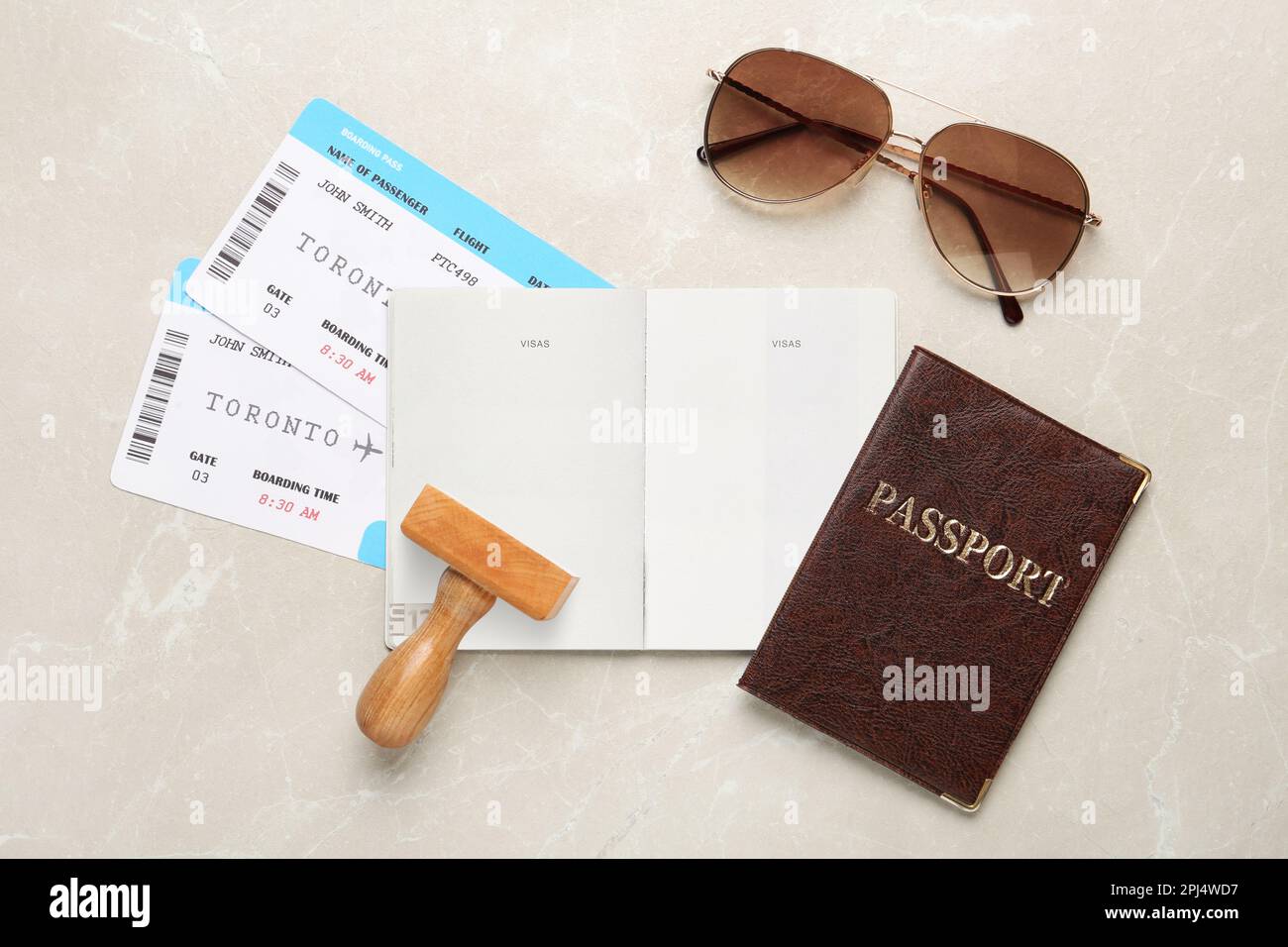 Flat lay composition with passports, stamp and flight tickets on light ...