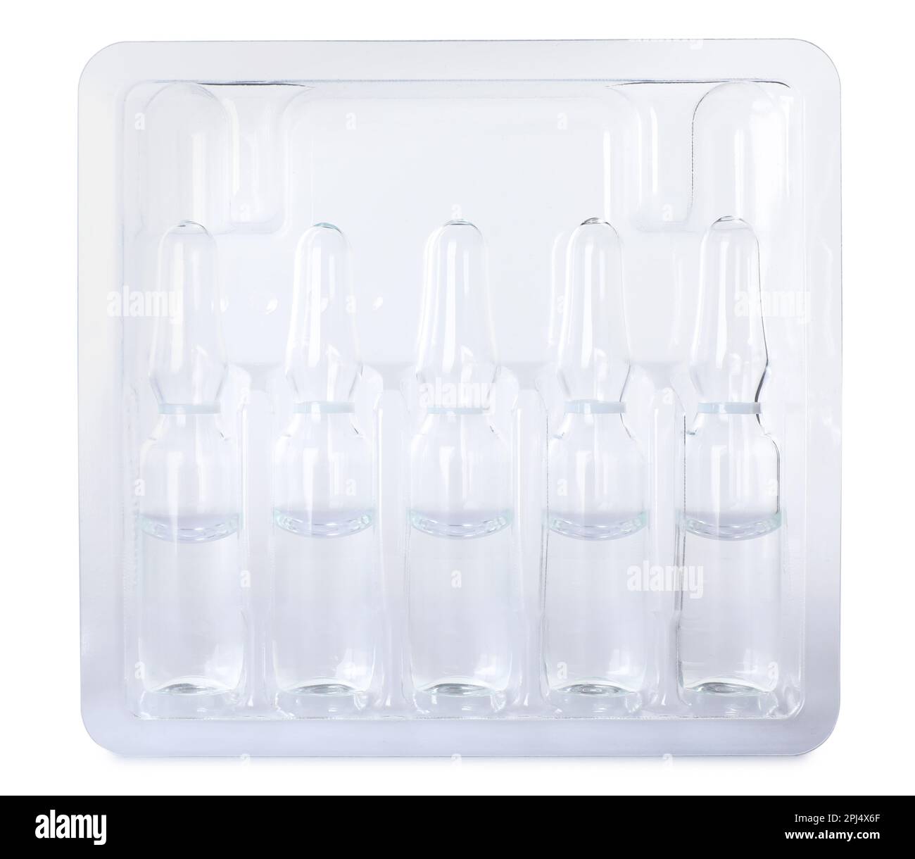 Glass ampoules with pharmaceutical product in tray on white background ...