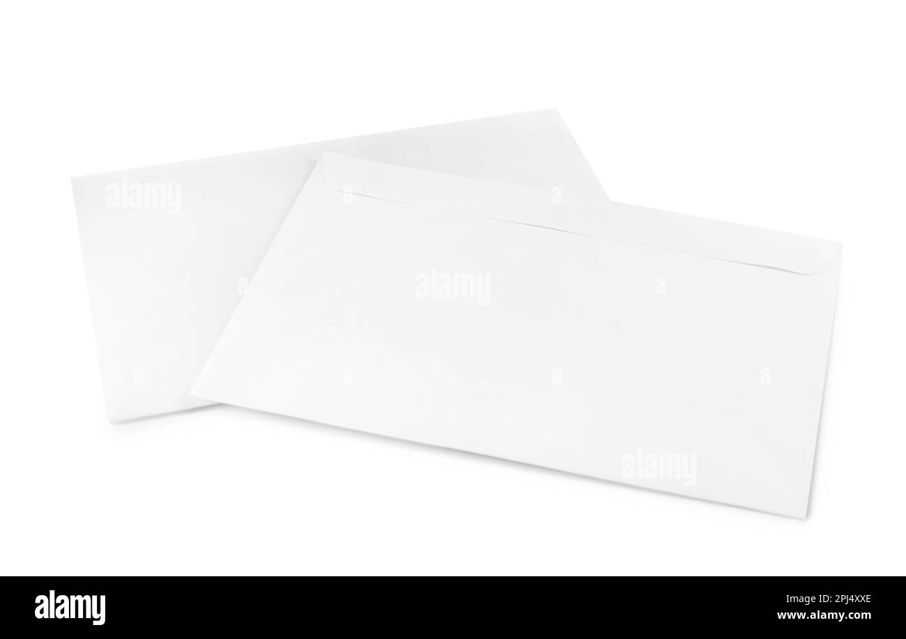 Two blank paper letters on white background Stock Photo - Alamy