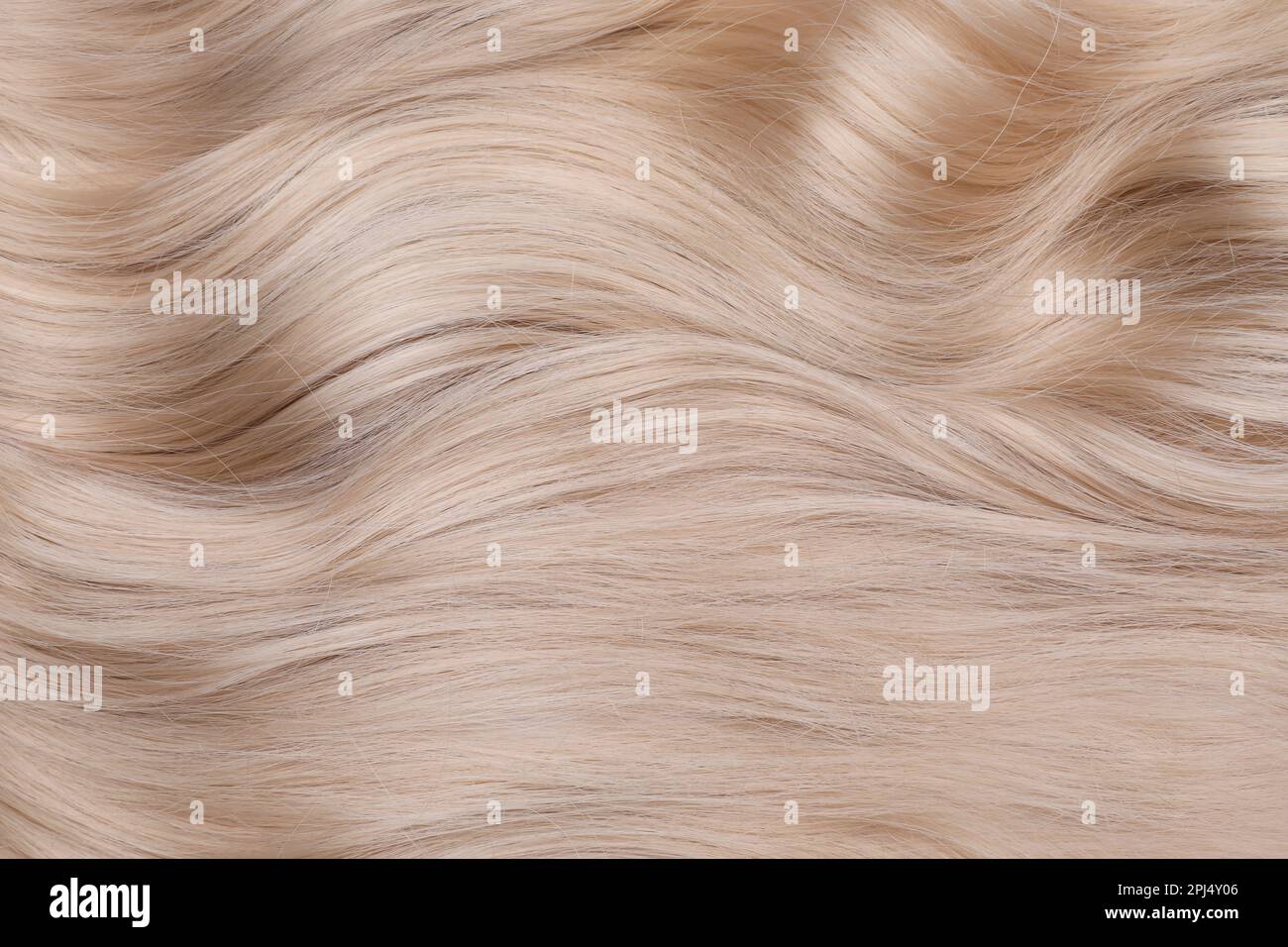Beautiful blonde hair as background, top view Stock Photo - Alamy