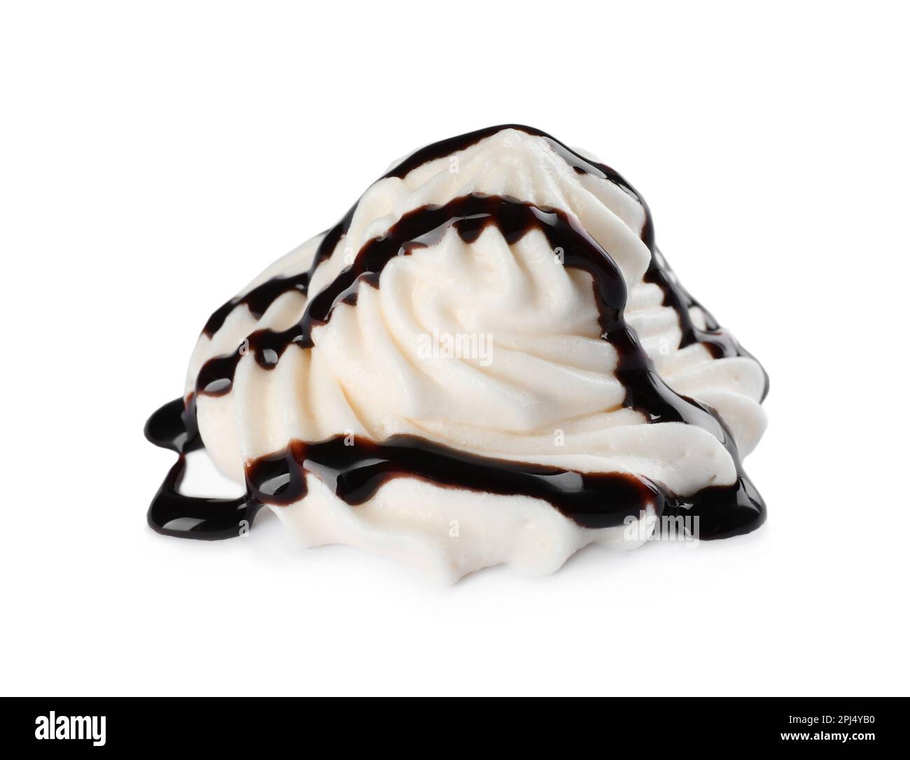Delicious fresh whipped cream with chocolate syrup isolated on white ...