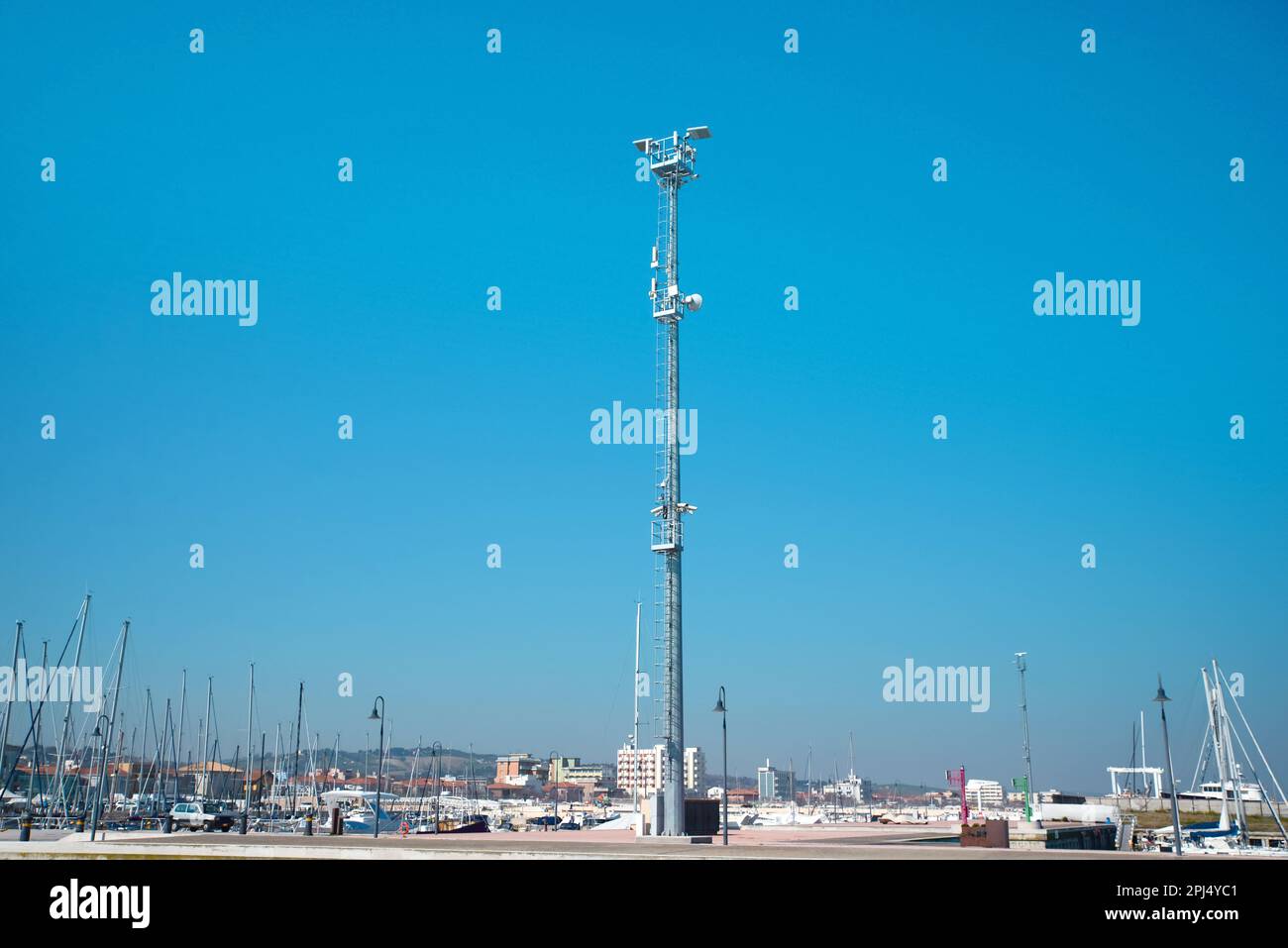 Light mast with CCTV and cellular communication system on pier Stock ...
