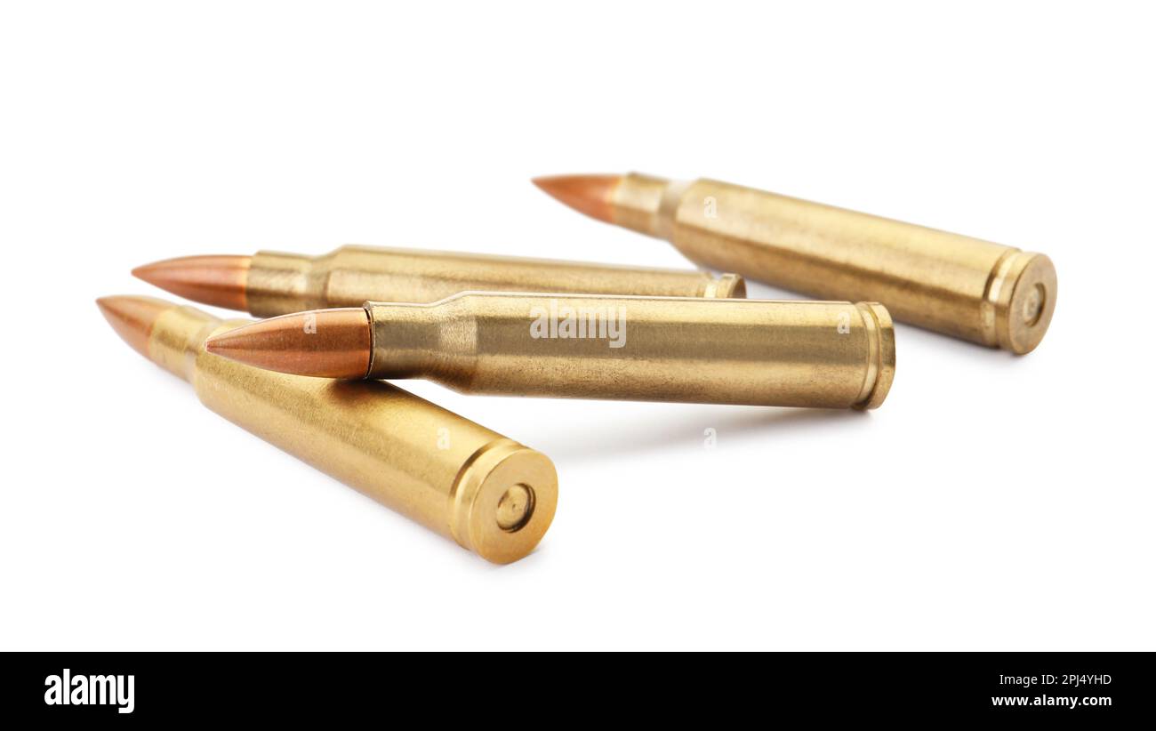 Many bullets on white background. Military ammunition Stock Photo - Alamy