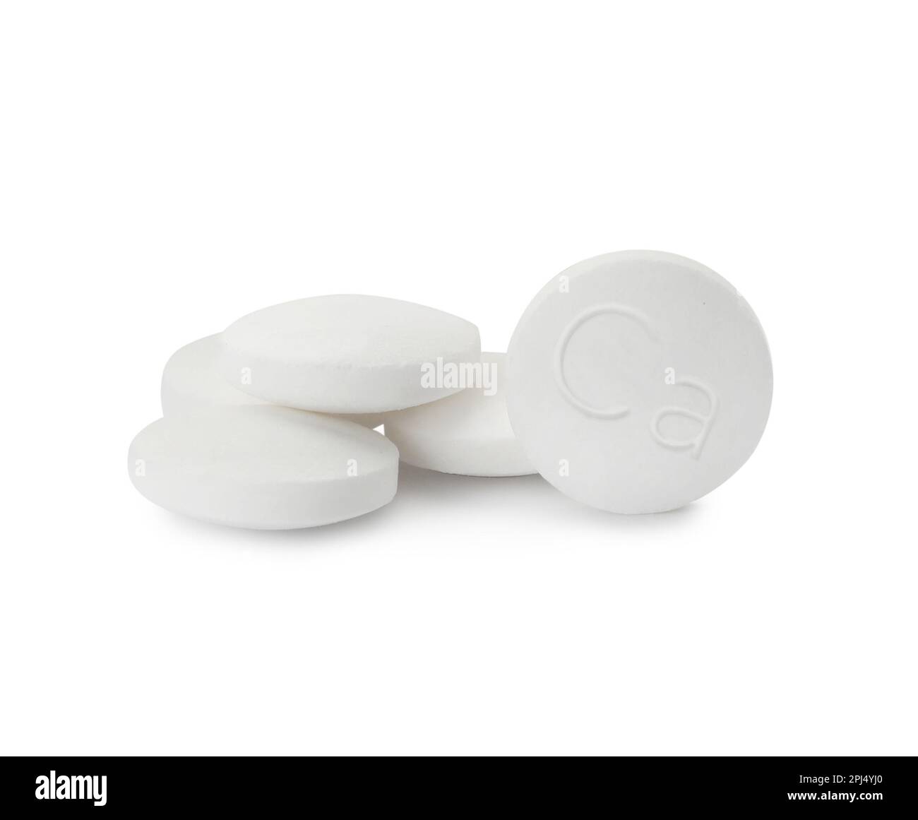 Pile of calcium supplement pills on white background Stock Photo - Alamy