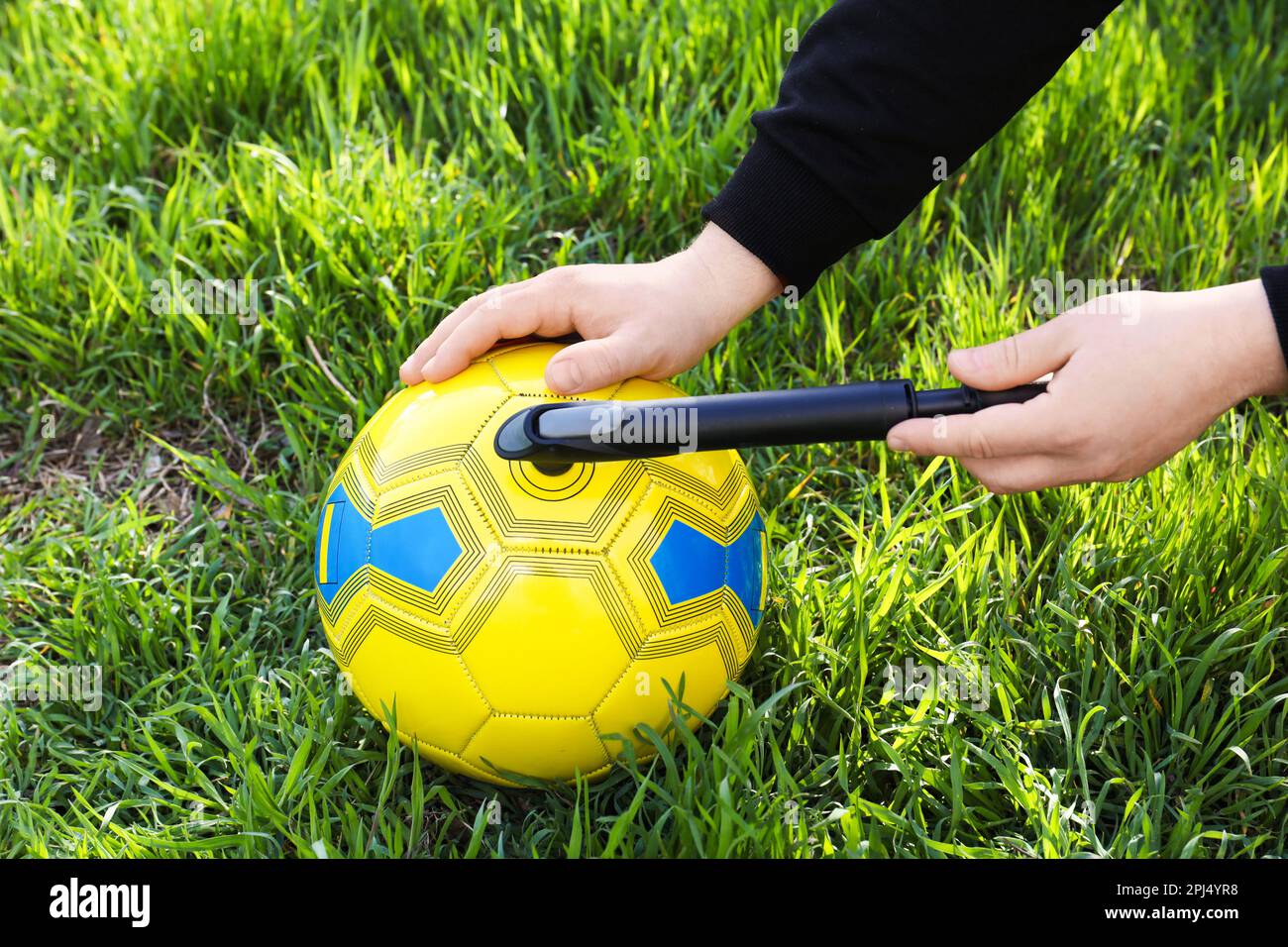 Manual pump soccer ball hi-res stock photography and images - Alamy
