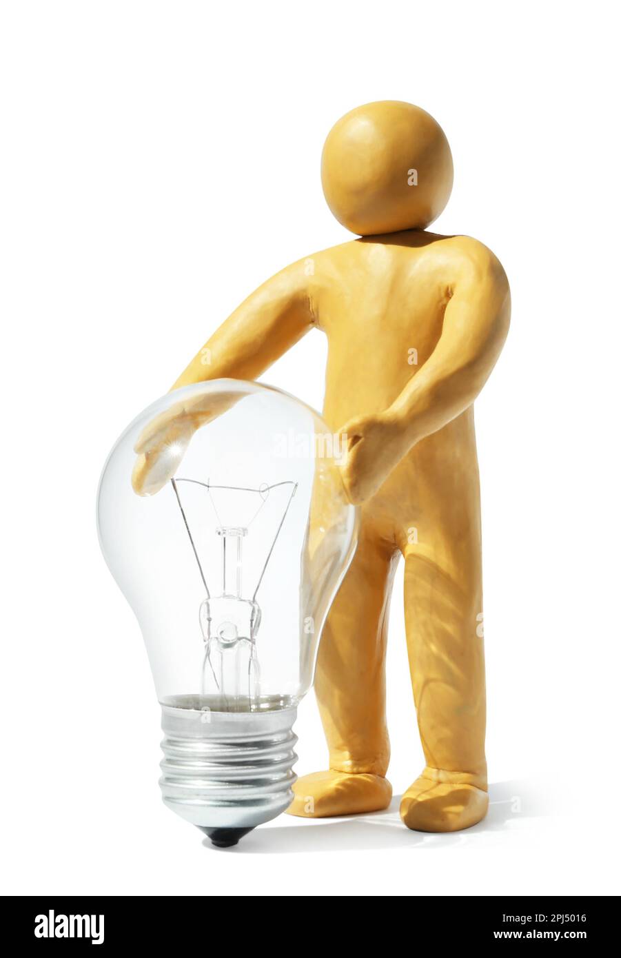 Human figure made of plasticine holding light bulb isolated on white ...