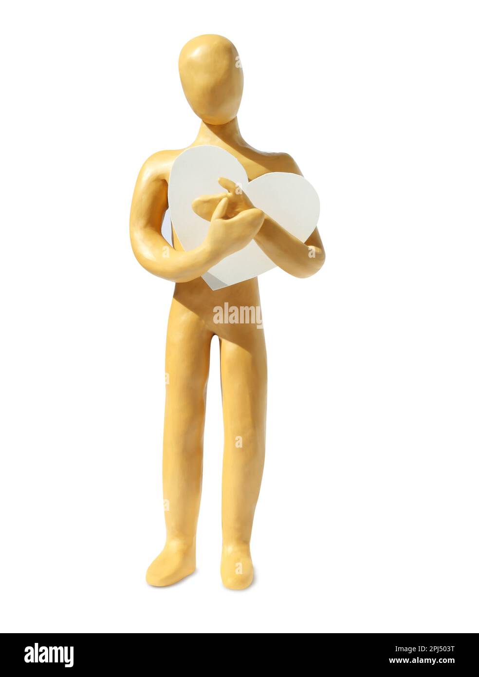 Yellow plasticine human figure with paper heart isolated on white Stock ...