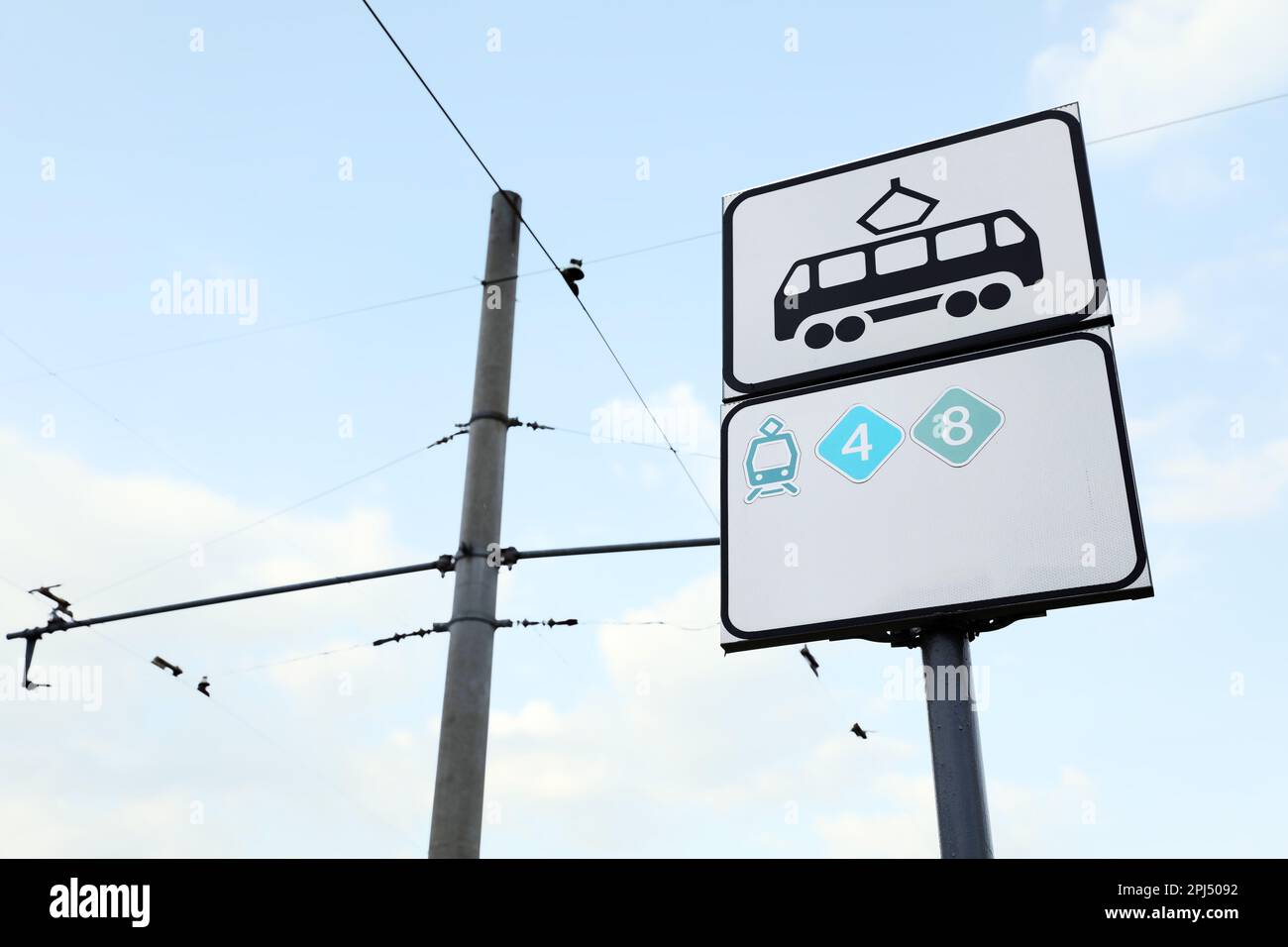 Tram stop sign against blue sky. Space for text Stock Photo - Alamy