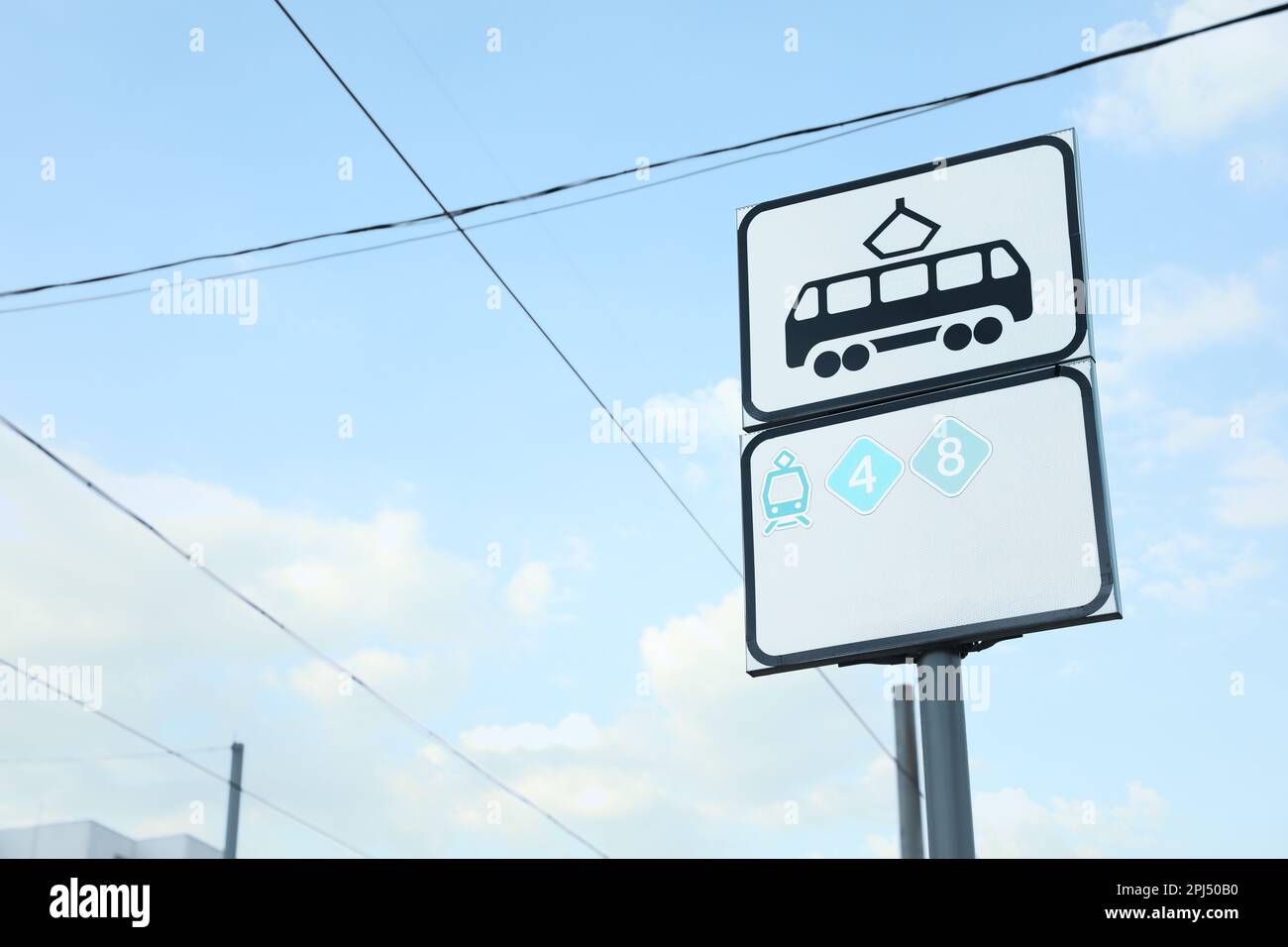 Tram stop sign against blue sky. Space for text Stock Photo - Alamy