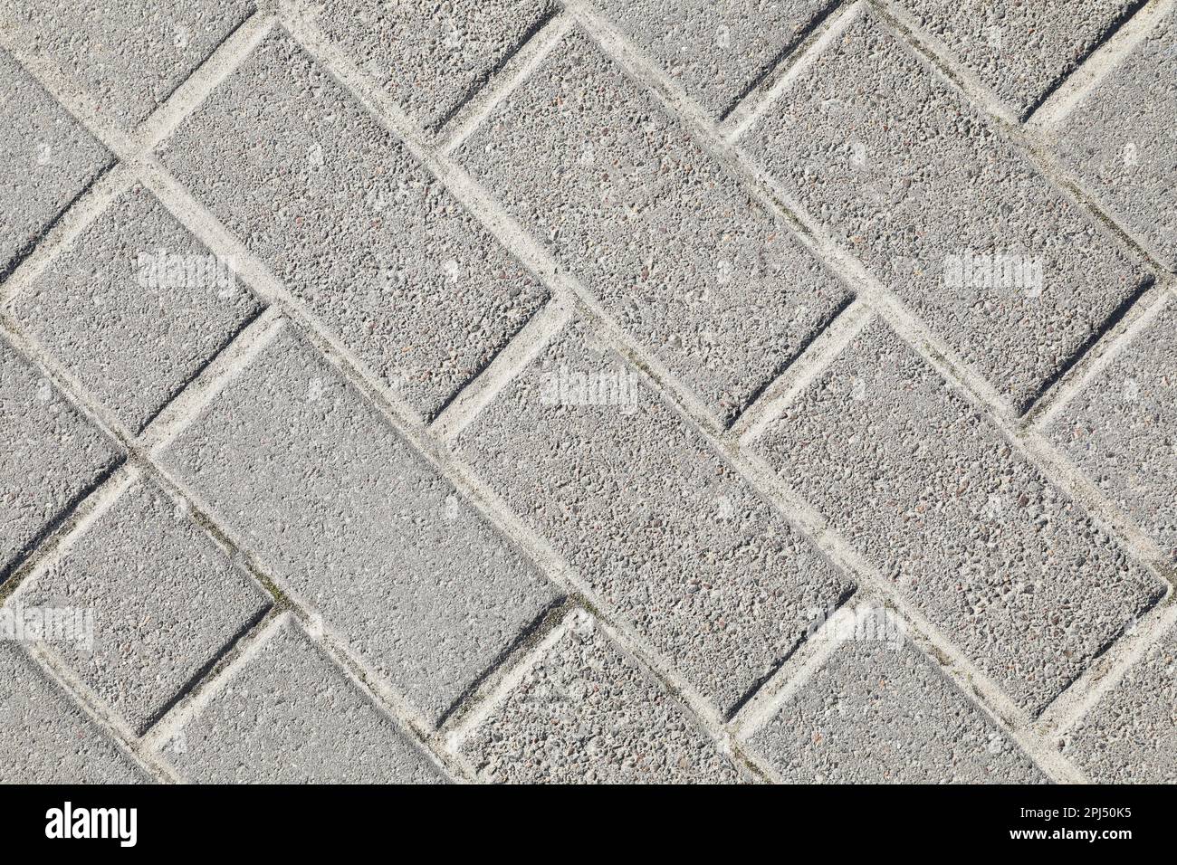 Pavement with grey tiles as background, top view Stock Photo - Alamy