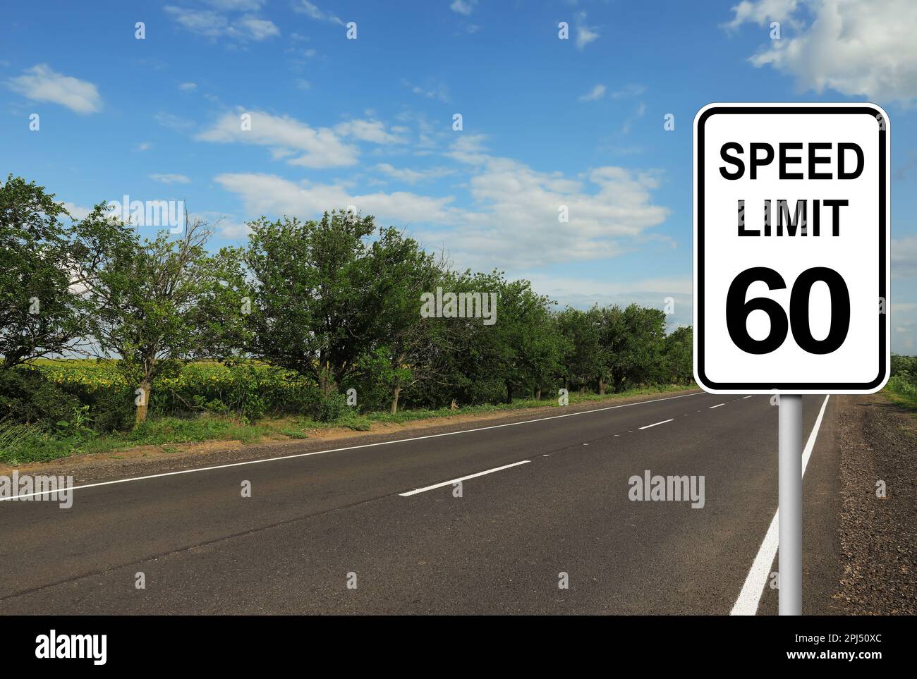 Car driving near speed sign hi-res stock photography and images - Alamy