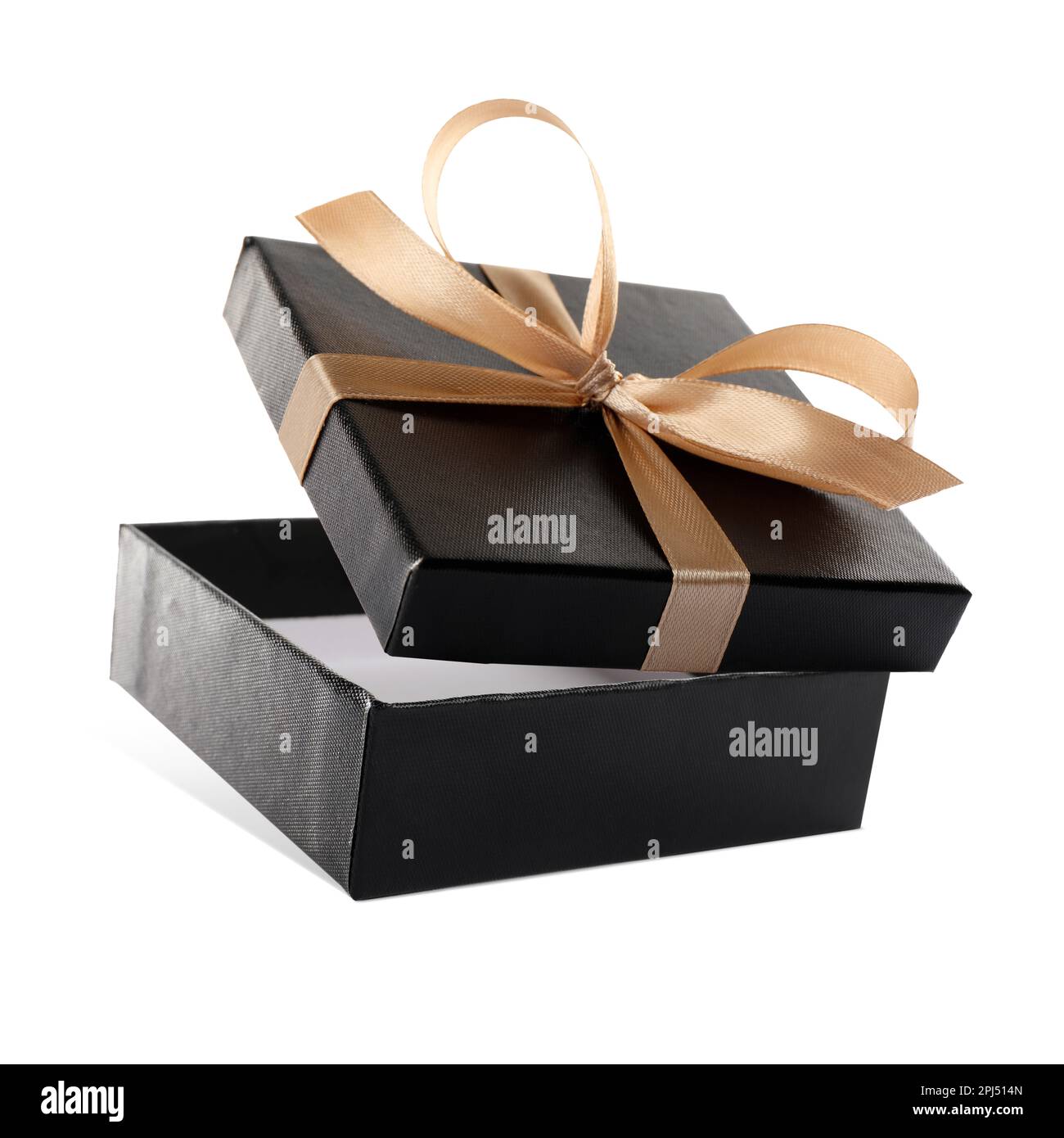 Beautiful black gift box with golden bow on white background Stock ...