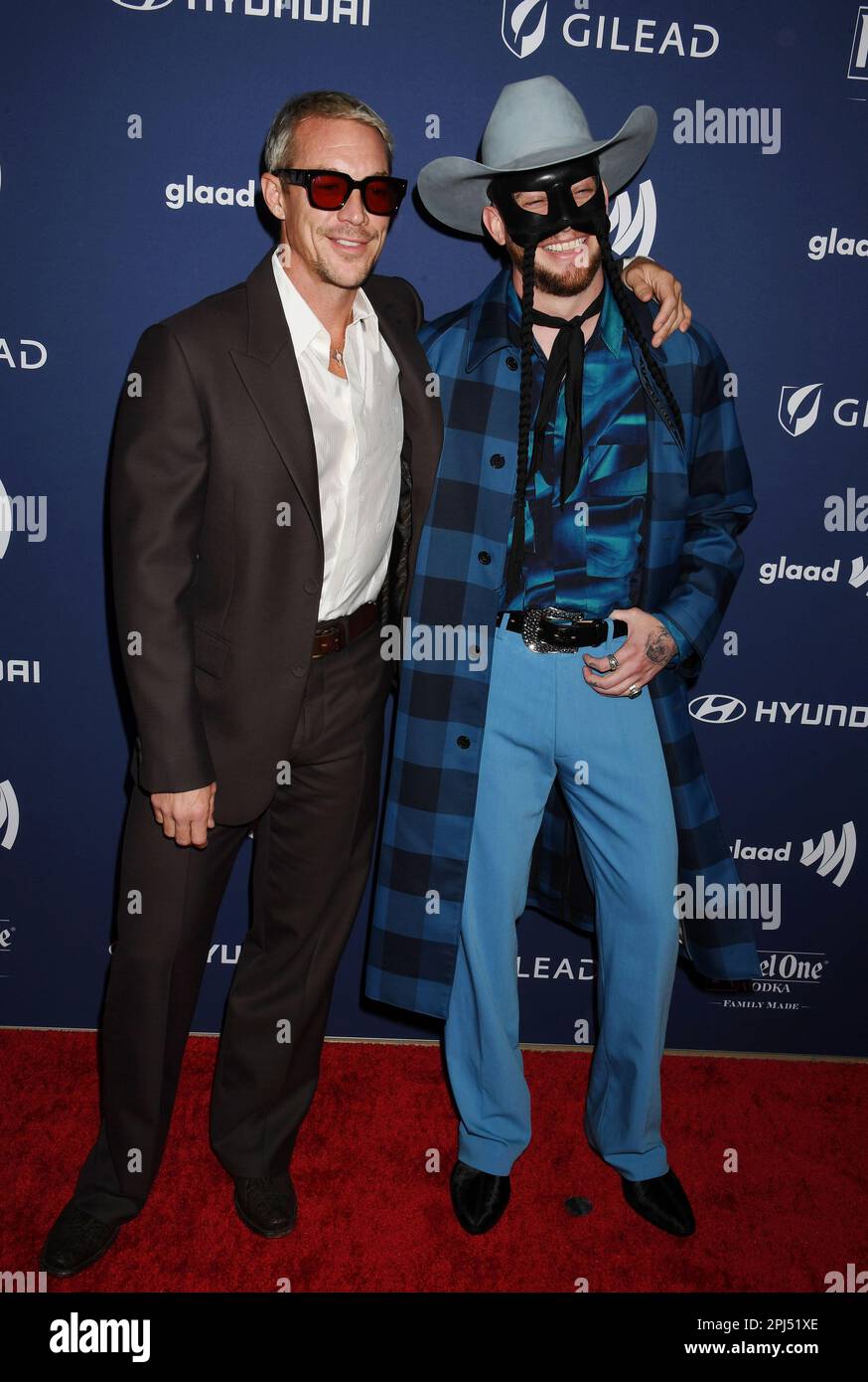 BEVERLY HILLS, CALIFORNIA - MARCH 30: (L-R) Diplo and Orville Peck ...