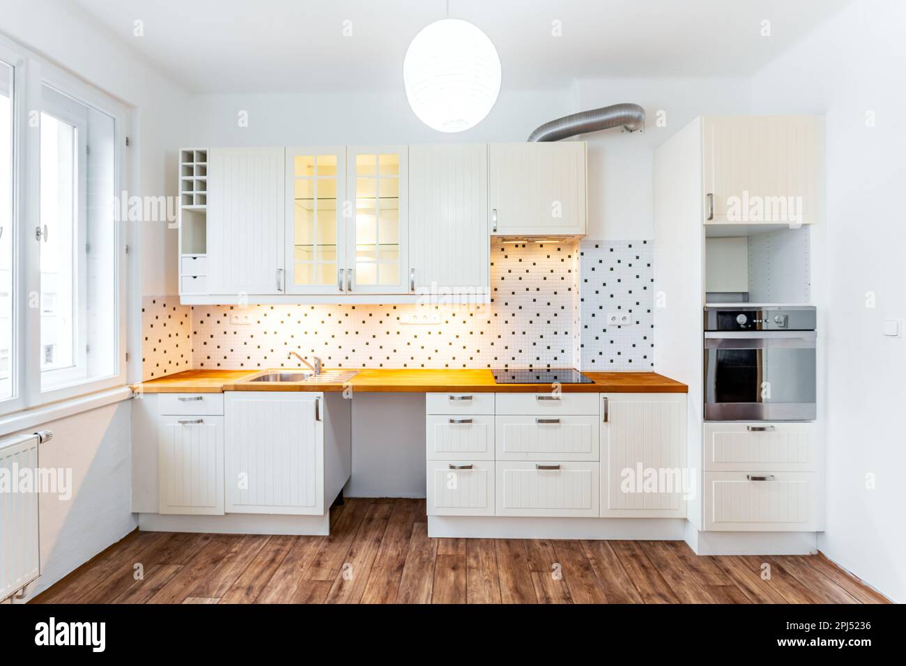 kitchen in an apartment of a residential building Stock Photo - Alamy