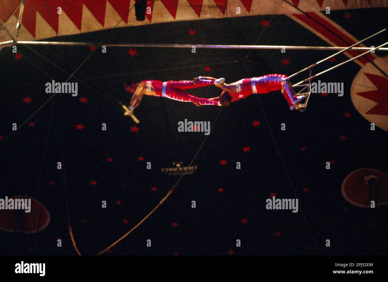 Circus Performers on Trapeze Stock Photo - Alamy