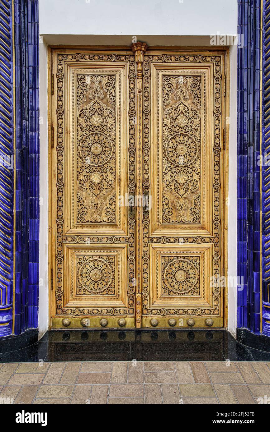 Carved antique wooden doors with patterns and mosaics Stock Photo - Alamy