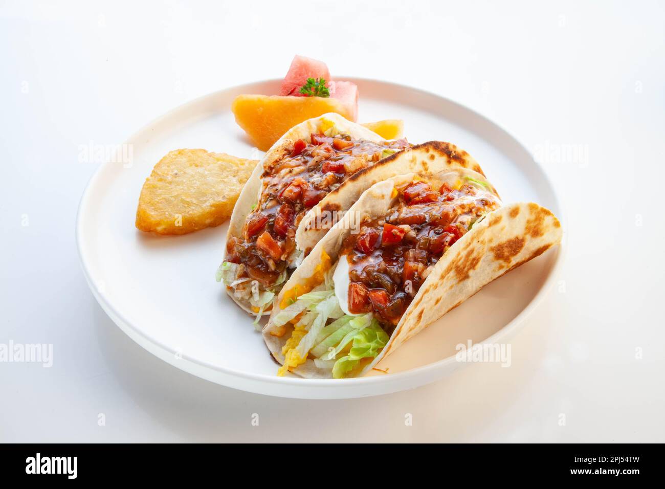 Soft shell delicious tacos for breakfast with hash brown and seasonal ...