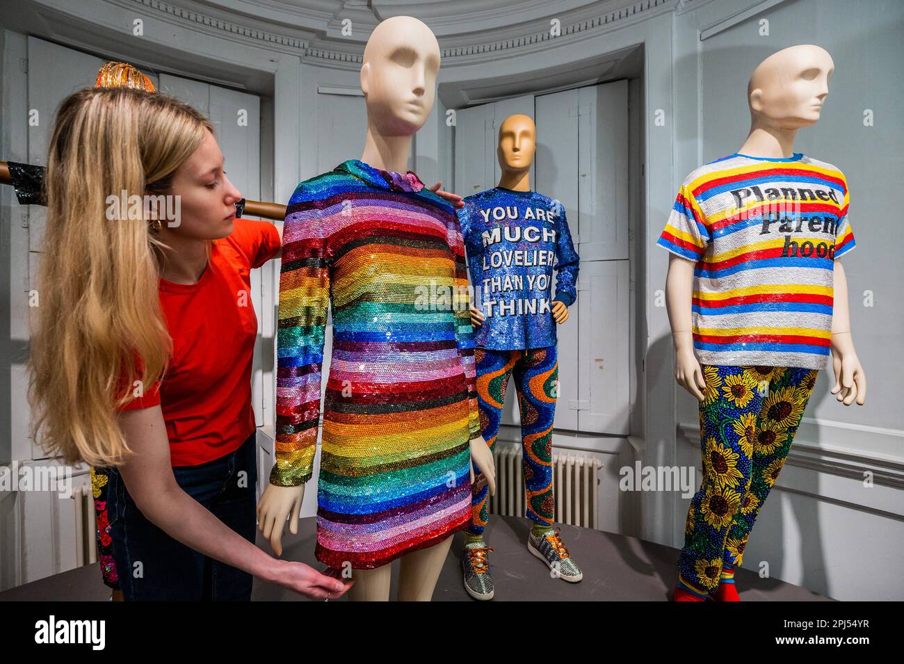 London, UK. 31st Mar, 2023. A glitter rainbow mini dress, worn by ...