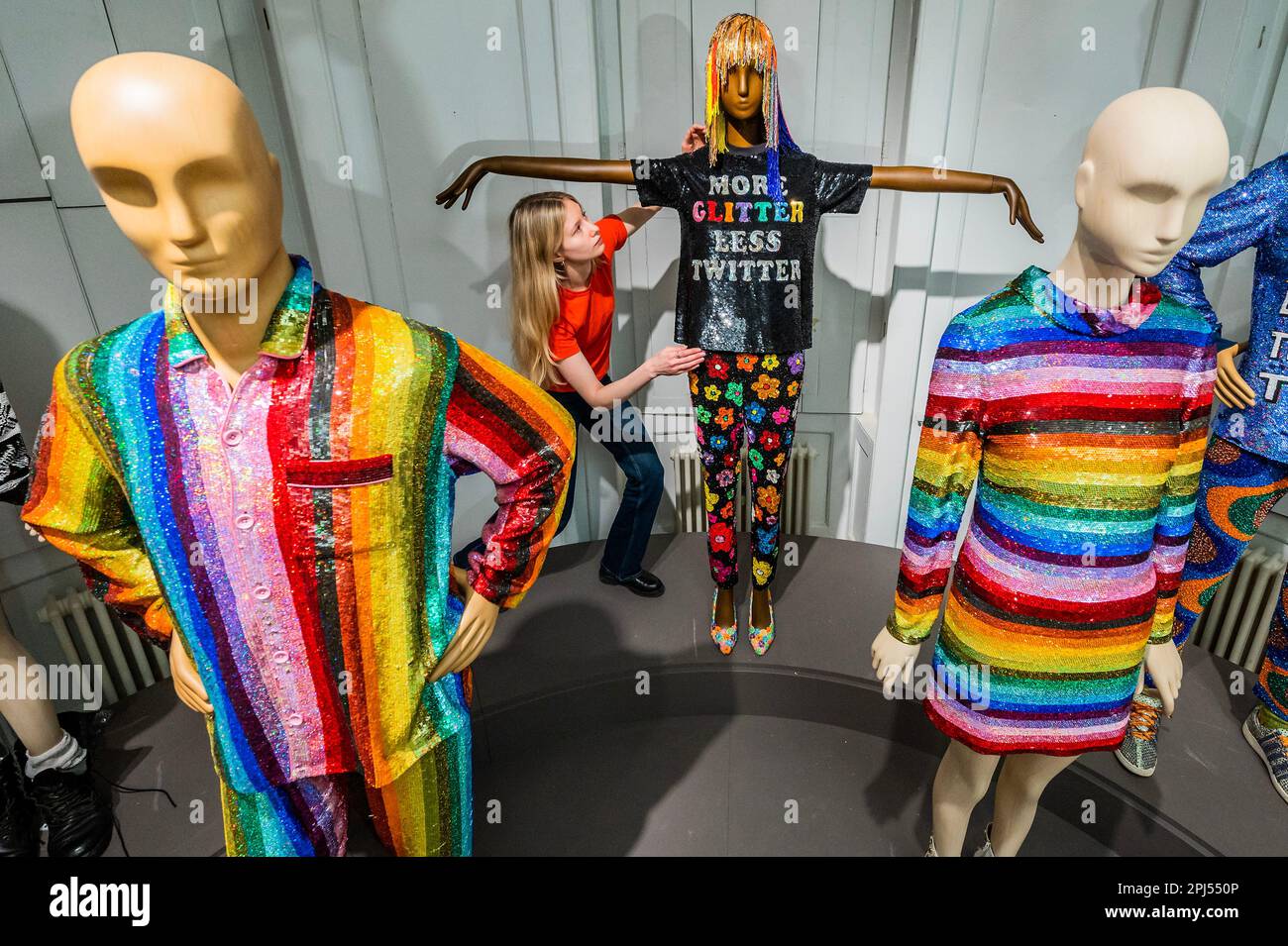 London, UK. 31st Mar, 2023. A glitter rainbow mini dress, worn by ...