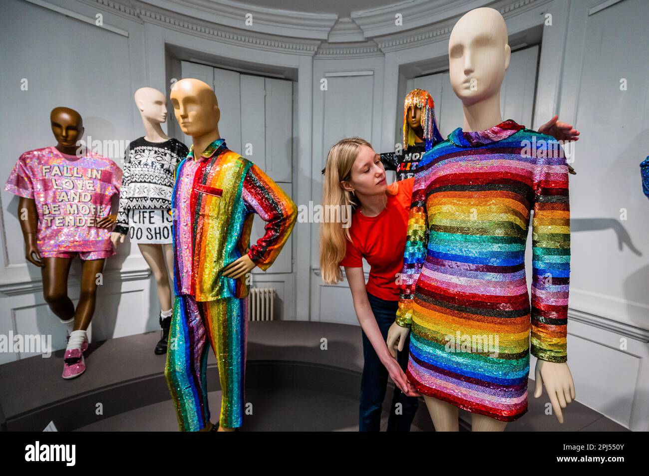 London, UK. 31st Mar, 2023. A glitter rainbow mini dress, worn by ...