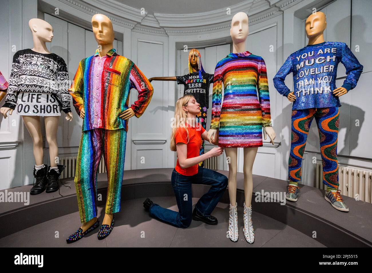 London, UK. 31st Mar, 2023. A glitter rainbow mini dress, worn by ...