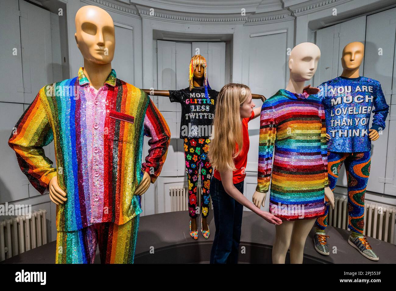 London, UK. 31st Mar, 2023. A glitter rainbow mini dress, worn by ...