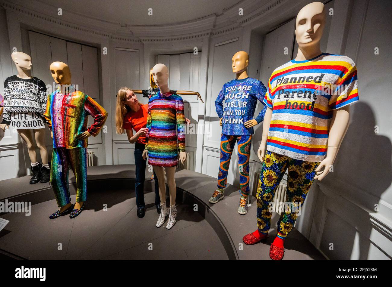 London, UK. 31st Mar, 2023. A glitter rainbow mini dress, worn by ...