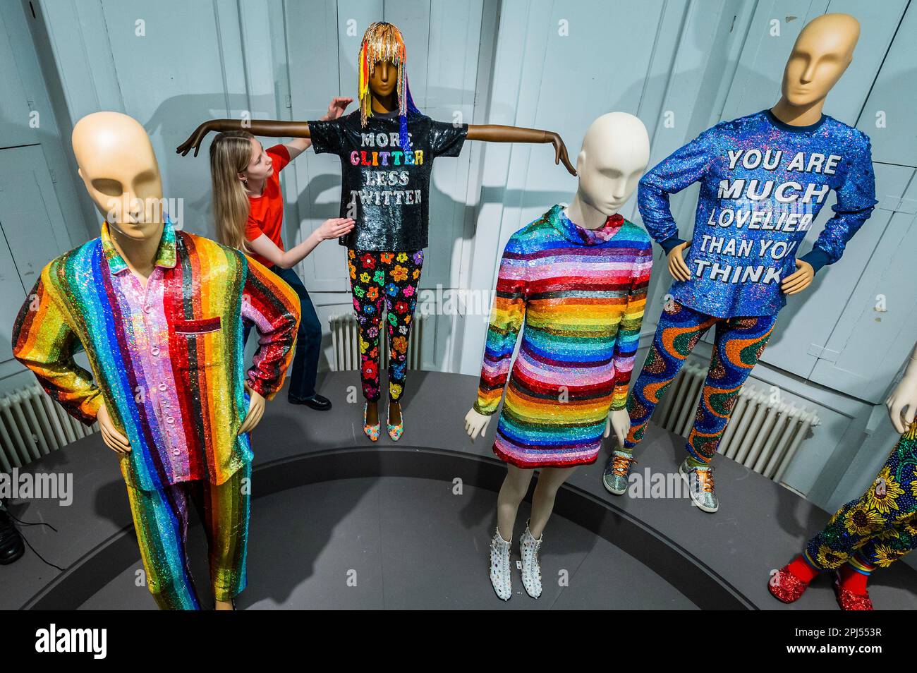 London, UK. 31st Mar, 2023. A glitter rainbow mini dress, worn by ...
