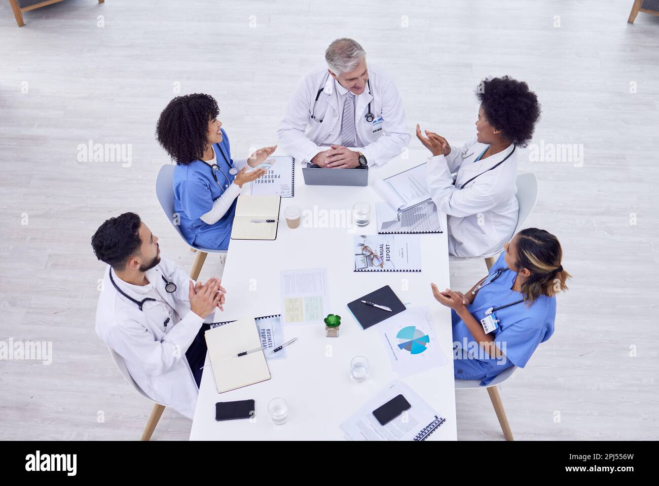 Doctors, nurses or clapping in hospital meeting, teamwork training ...