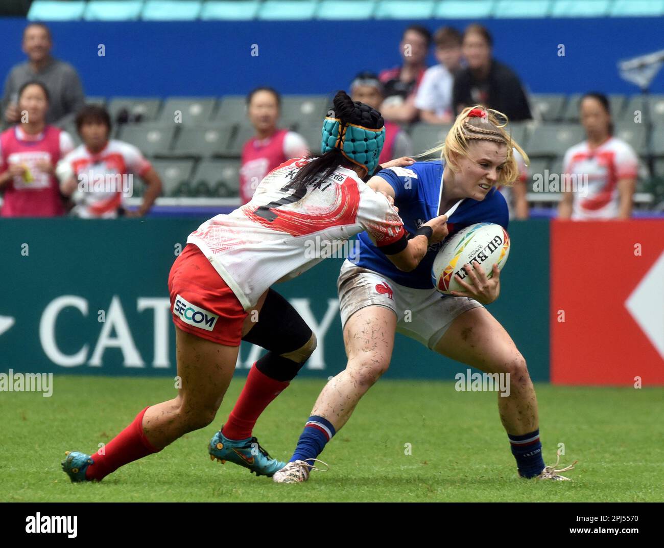 Hong Kong. 31st Mar, 2023. Chloe Jacquet (R) of France vies with Kajiki ...