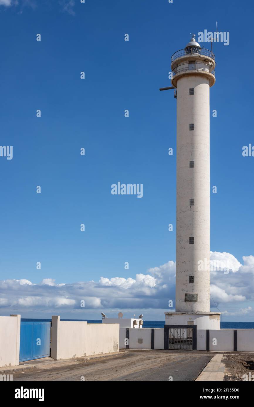 Lighthouse in an industrial zone of the capital city. Tall white ...