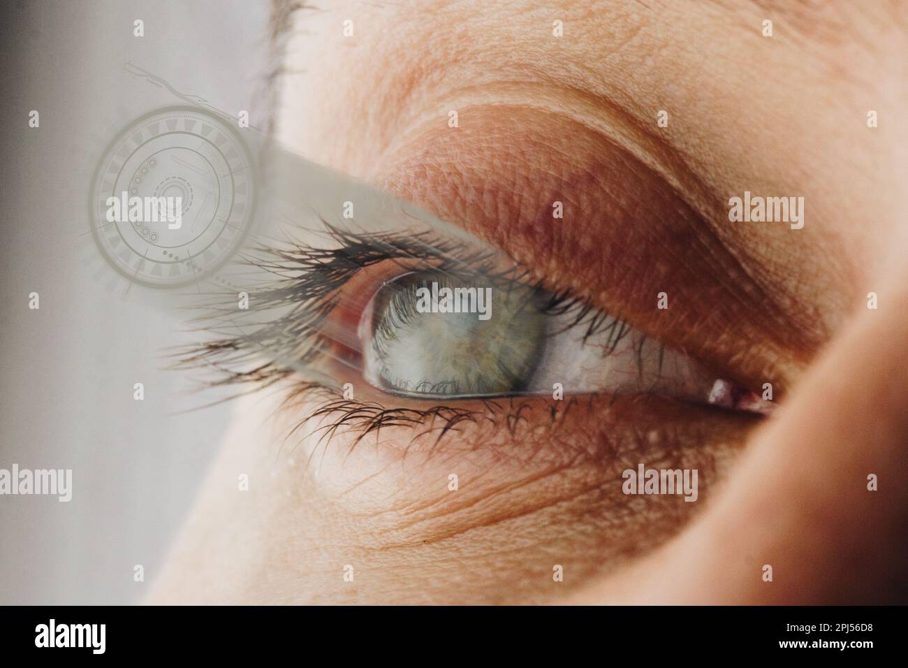Eye with a futuristic vision of a person, control and protection of ...