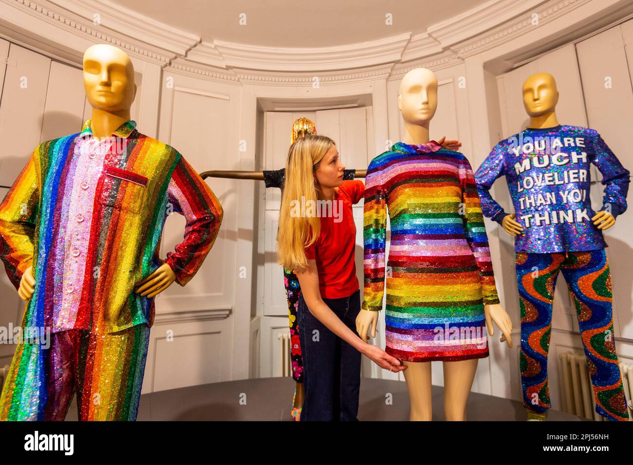 London, UK. 31 March 2023. A staff member with 'Rainbow dress', AW2017 ...