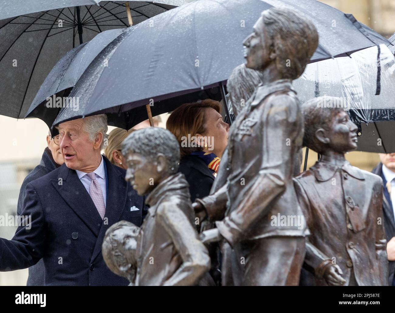 31 March 2023, Hamburg: King Charles III (l) of Great Britain stands ...