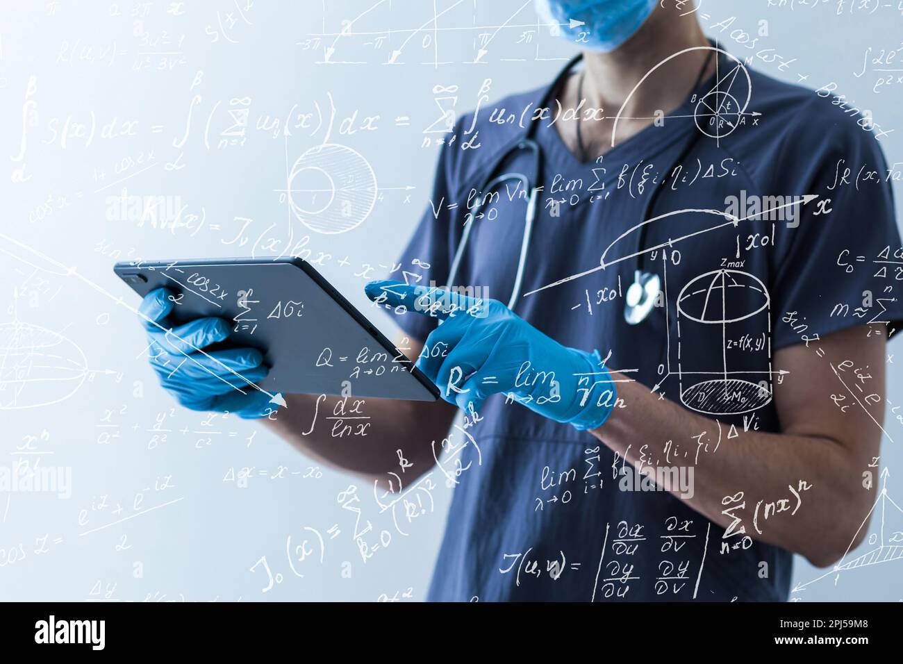 Quantitative analyst is drawing different math formulas on the glass ...