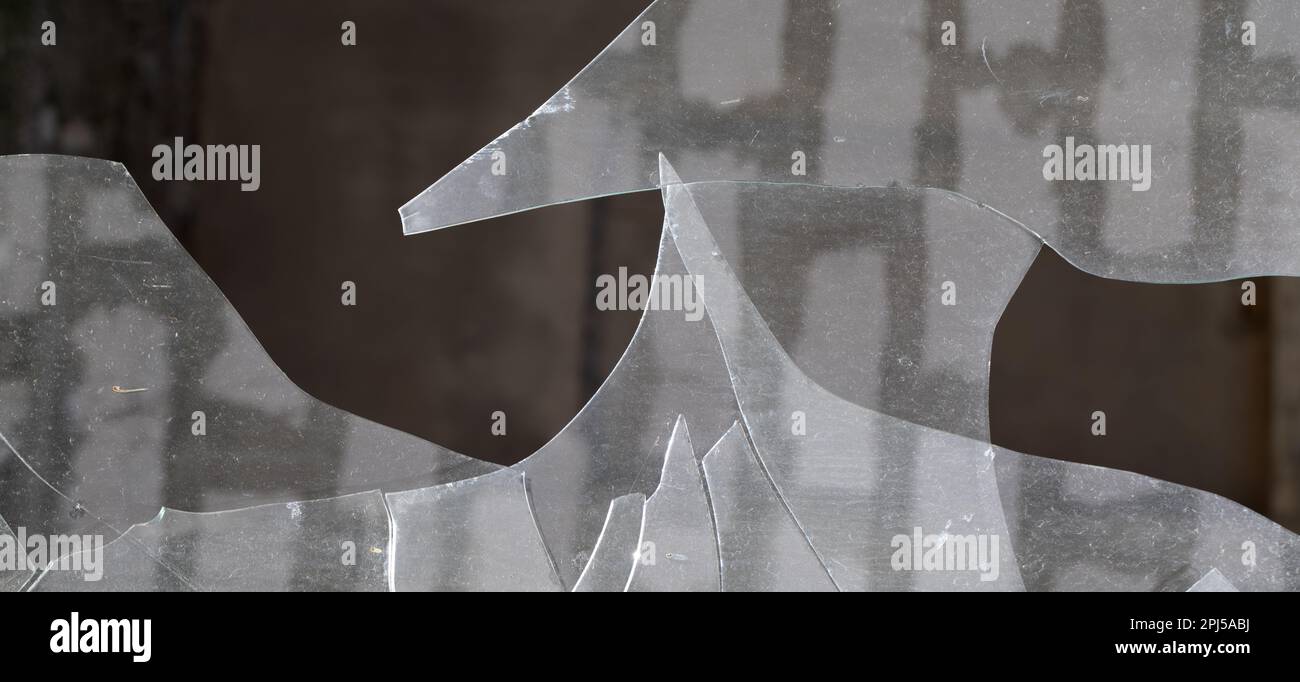 bullet hole in glass is a real bullet hole of a large caliber ...