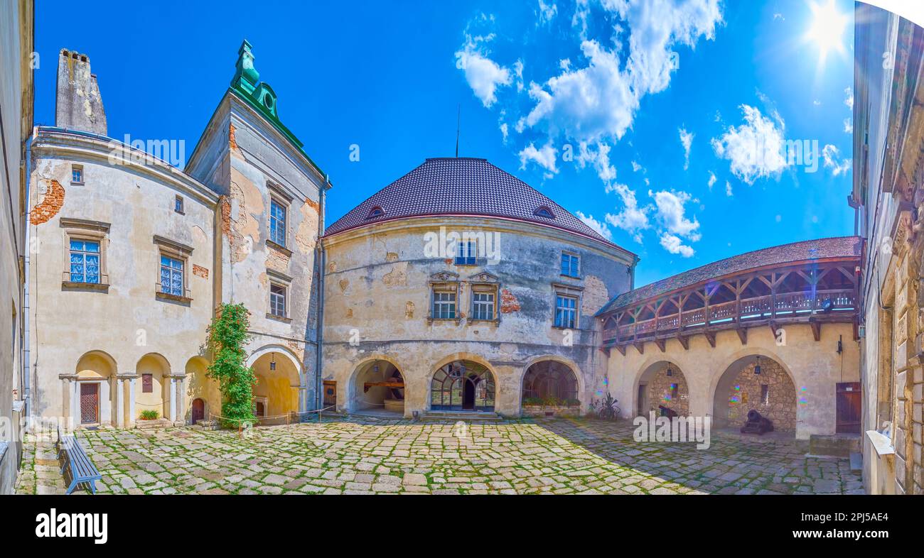 Panorama of Olesko Castle's inner courtyard with preserved wooden ...