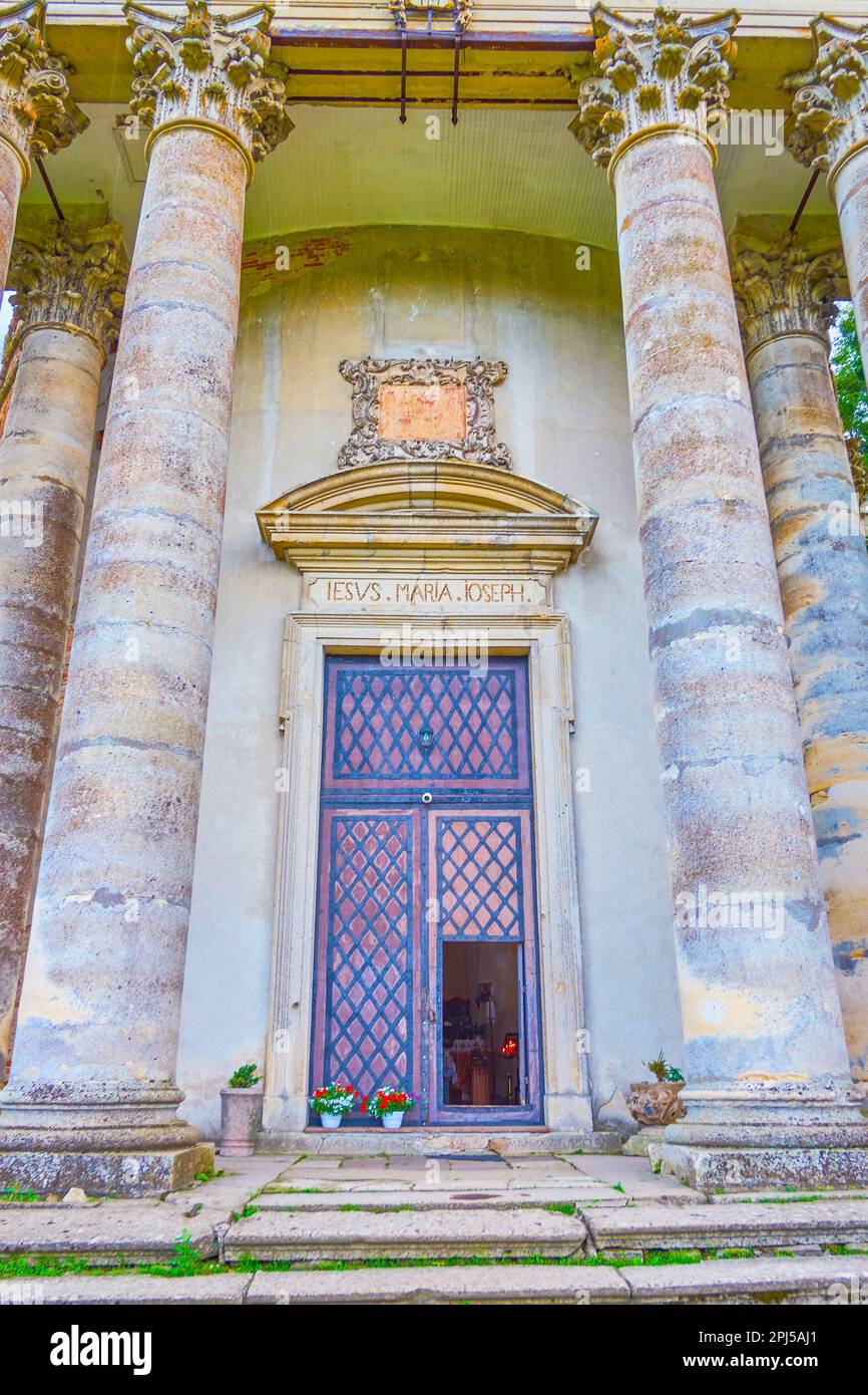 The entrance with colonnade facade to St Joseph Church in Pidhirtsi ...