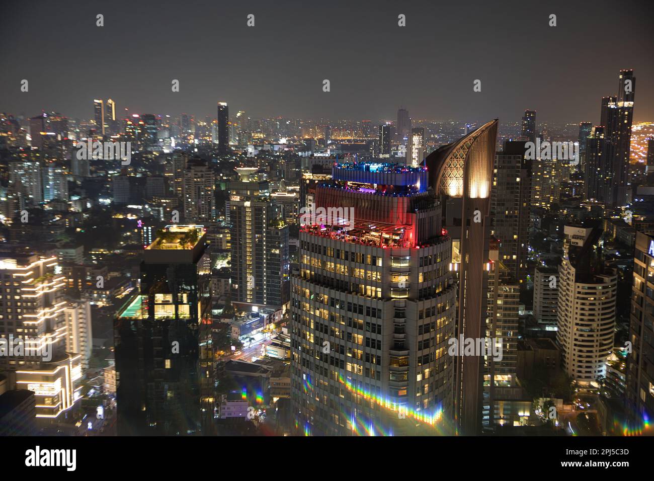 Spectacular view over the city lights of Bankok in Thailand at night ...