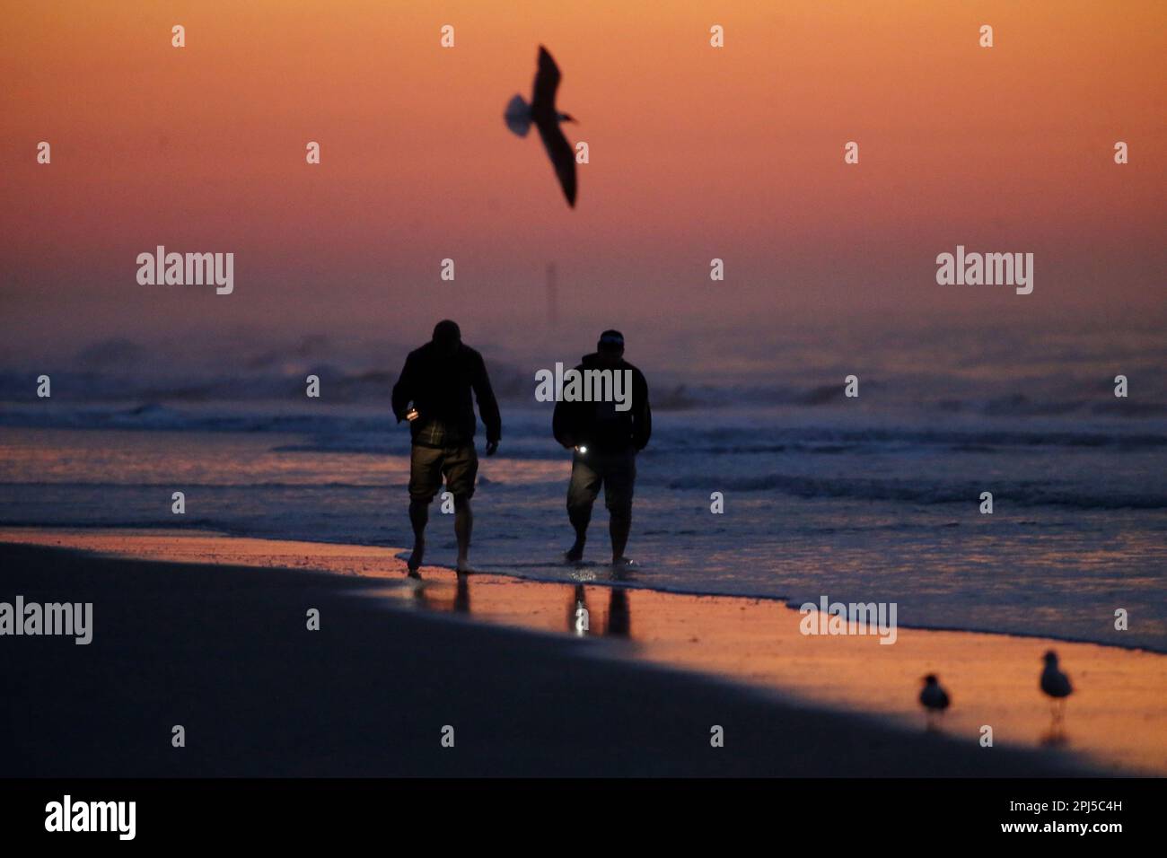 Surf City, North Carolina, USA. 31st Mar, 2023. SEAN HEARN, l, and ...