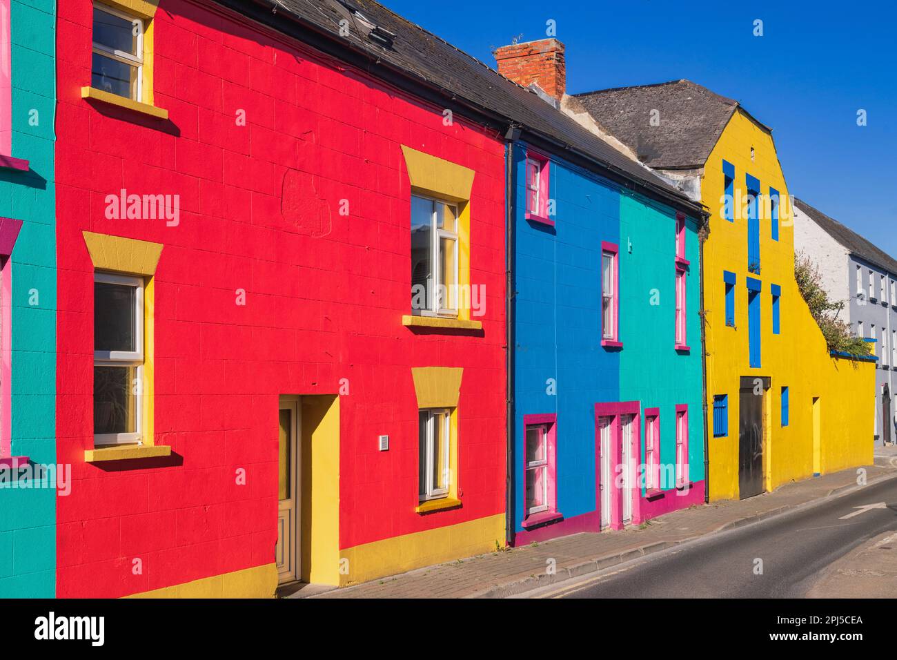 Ireland, County Wexford, New Ross, row of colourfully painted houses ...