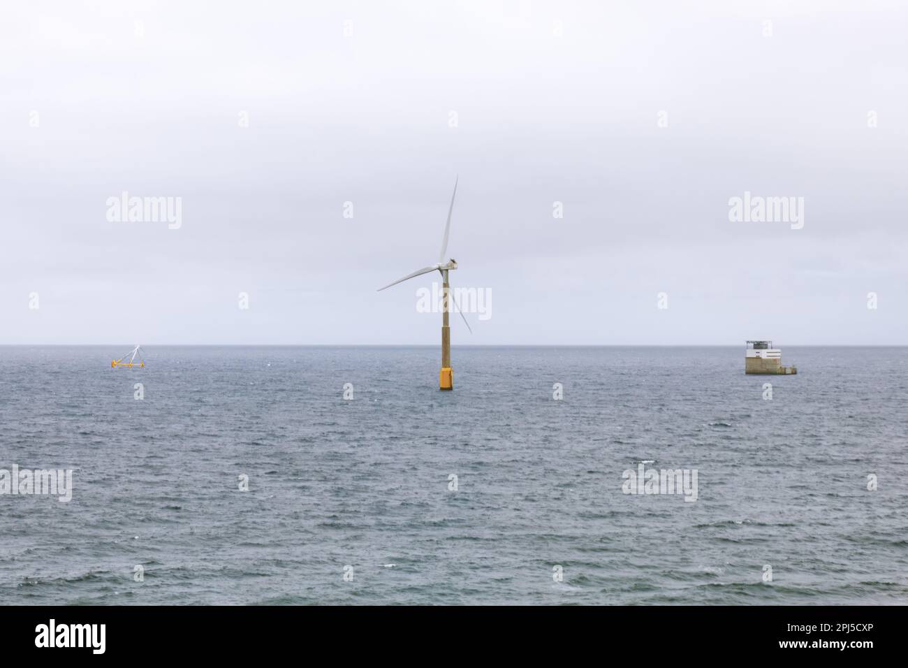 Single wind turbine in the ocean . Offshore Windmill Stock Photo - Alamy