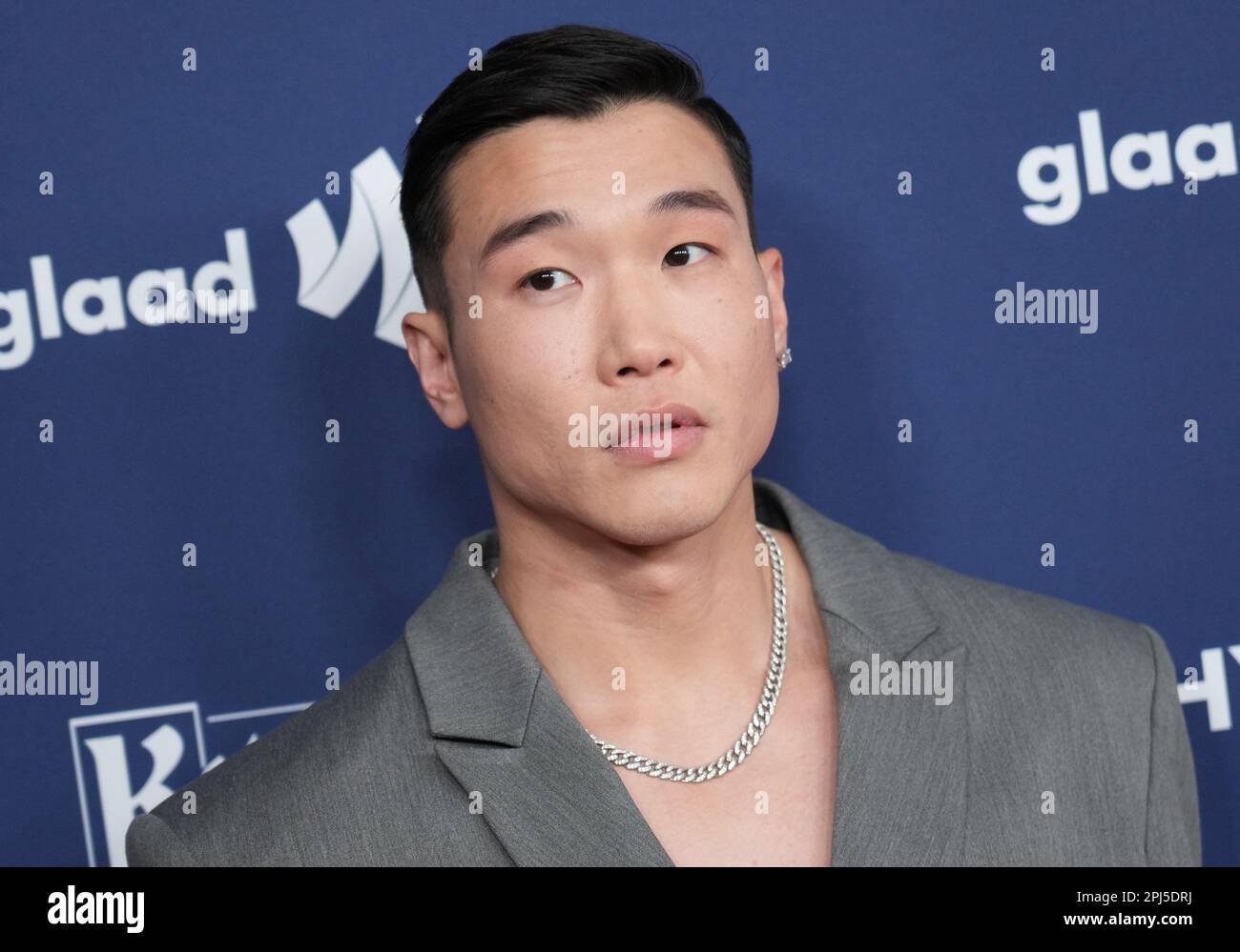Joel Kim Booster arrives at the 34th Annual GLAAD Media Awards held at ...