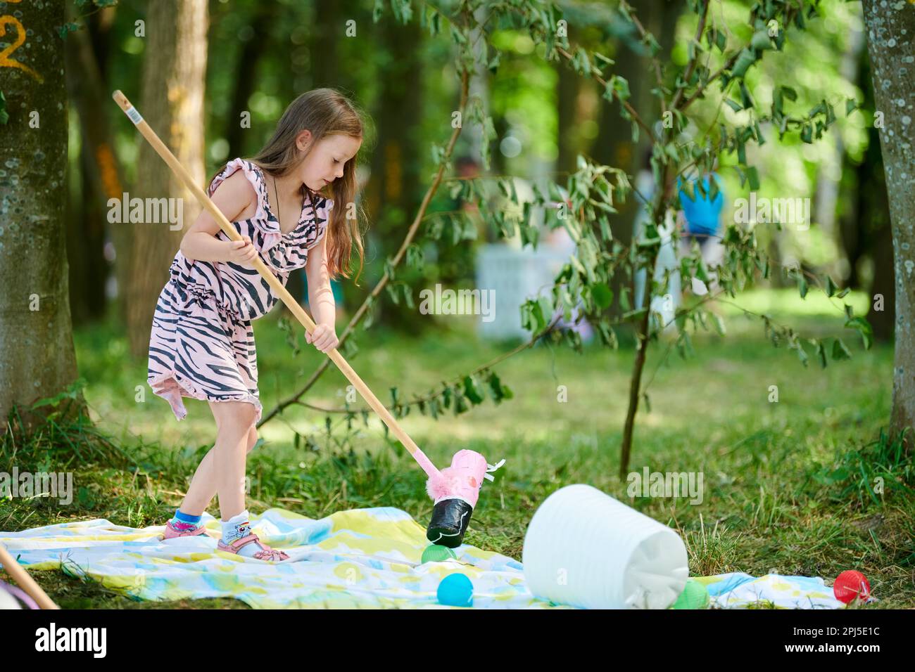 Svetlogorsk, Russia - 13.08.2022 - Young girl plays croquet with ...