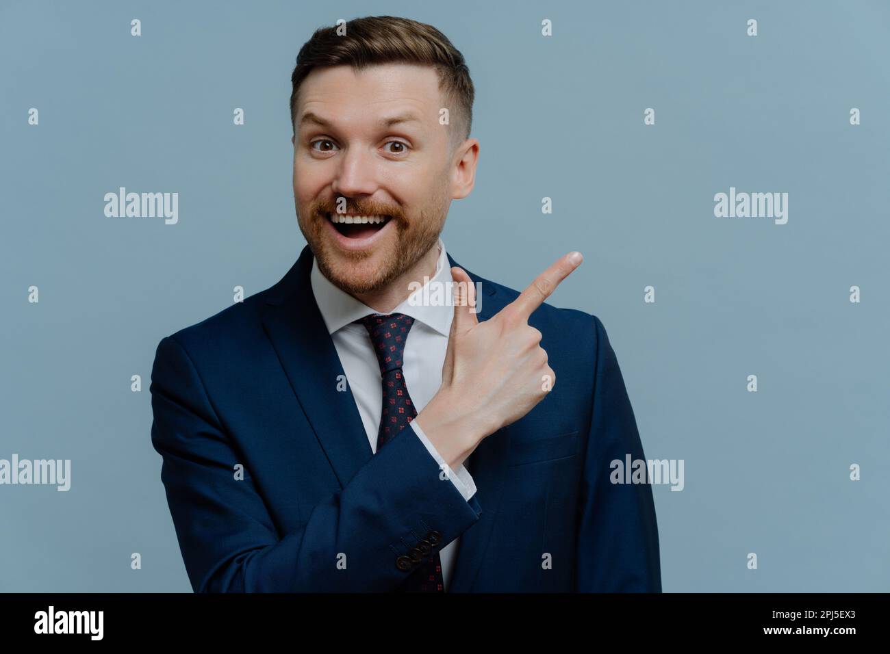 Happy successful male entrepreneur with bristle dressed in formal ...