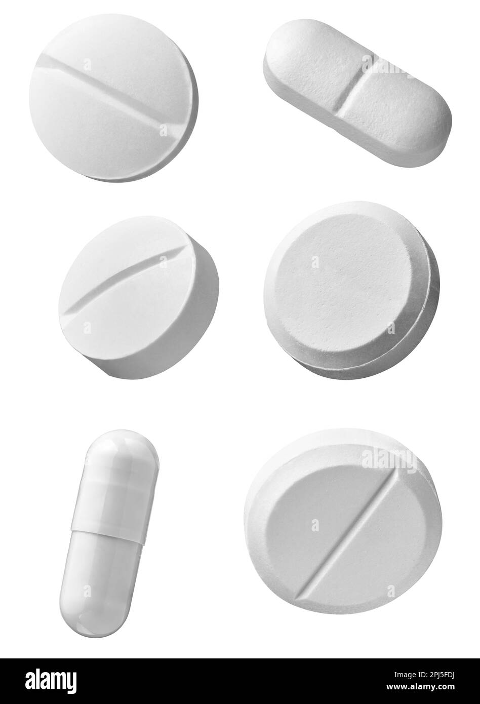 collection of various white pilsl on white background Stock Photo - Alamy