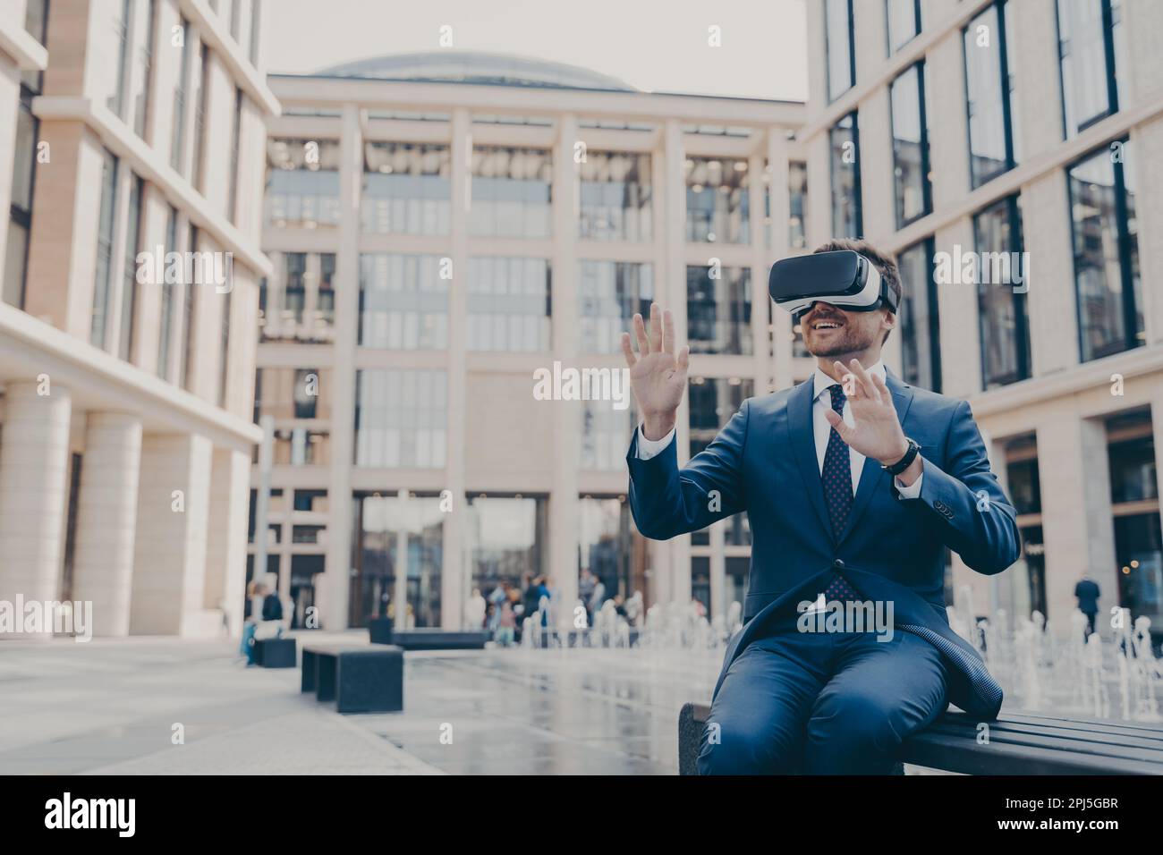 New age of business. Impressed young businessman or office worker ...