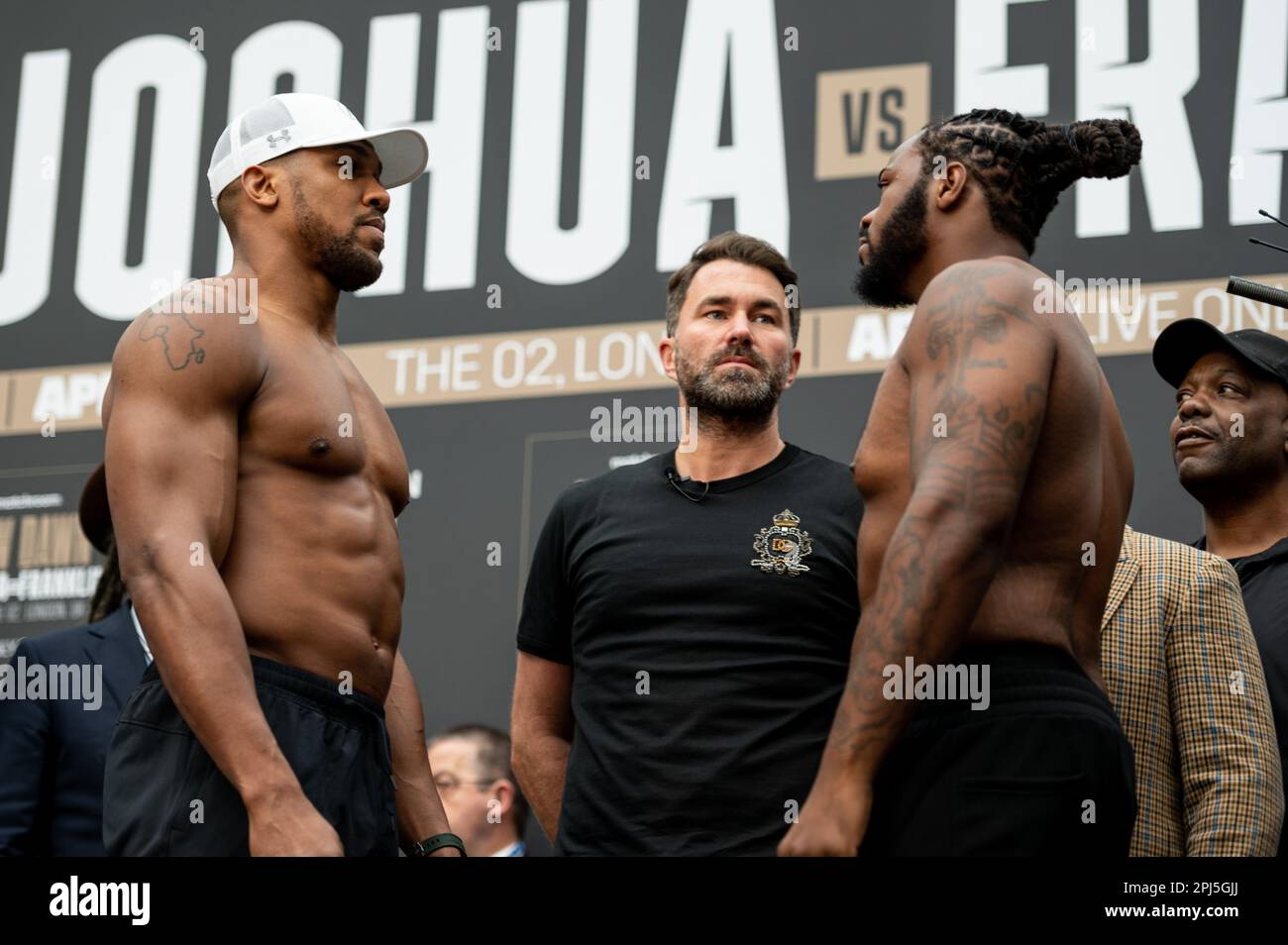 Boxing promoter Eddie Hearn stands in the centre as Anthony Joshua and ...
